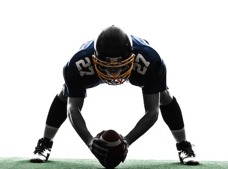 one center american football player man in silhouette studio isolated ...